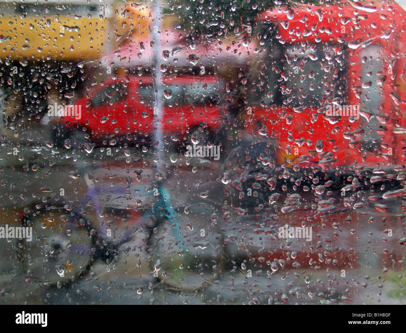 abstract street scene with rain drops on window Stock Photo - Alamy