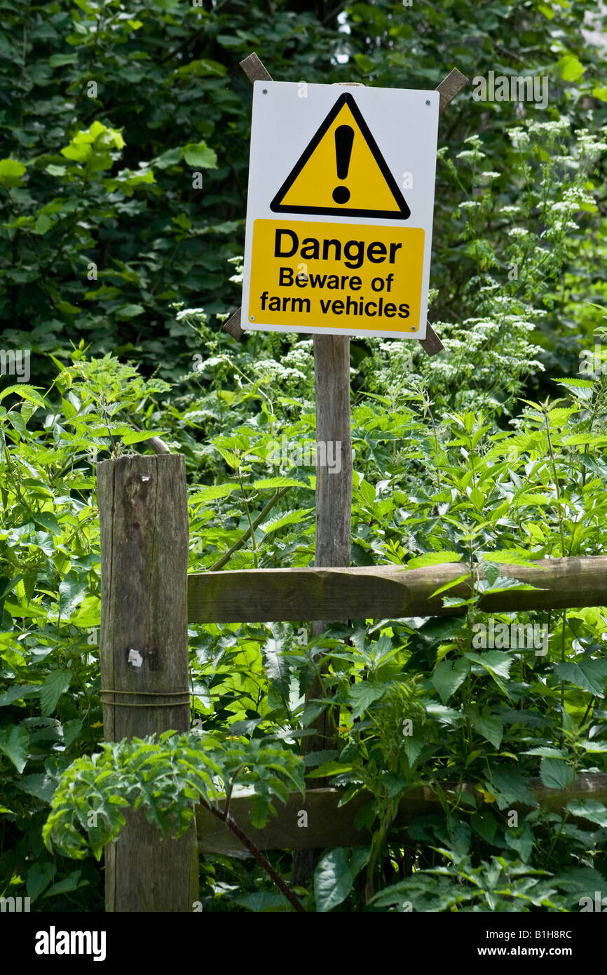 Danger Beware of Farm Vehicles Sign Post Stock Photo - Alamy