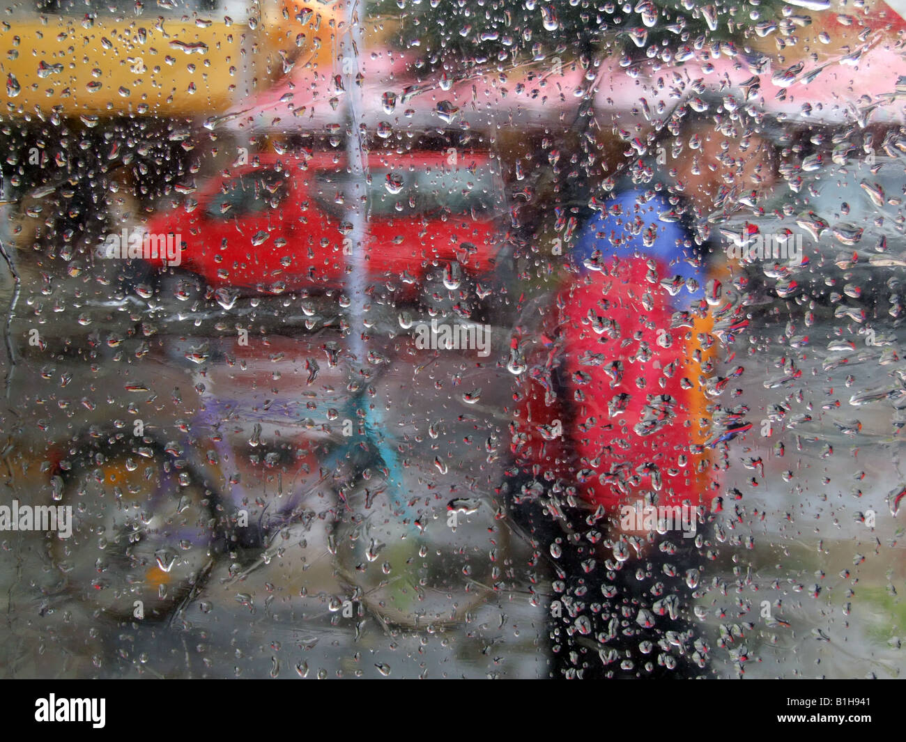 abstract street scene with rain drops on window Stock Photo - Alamy