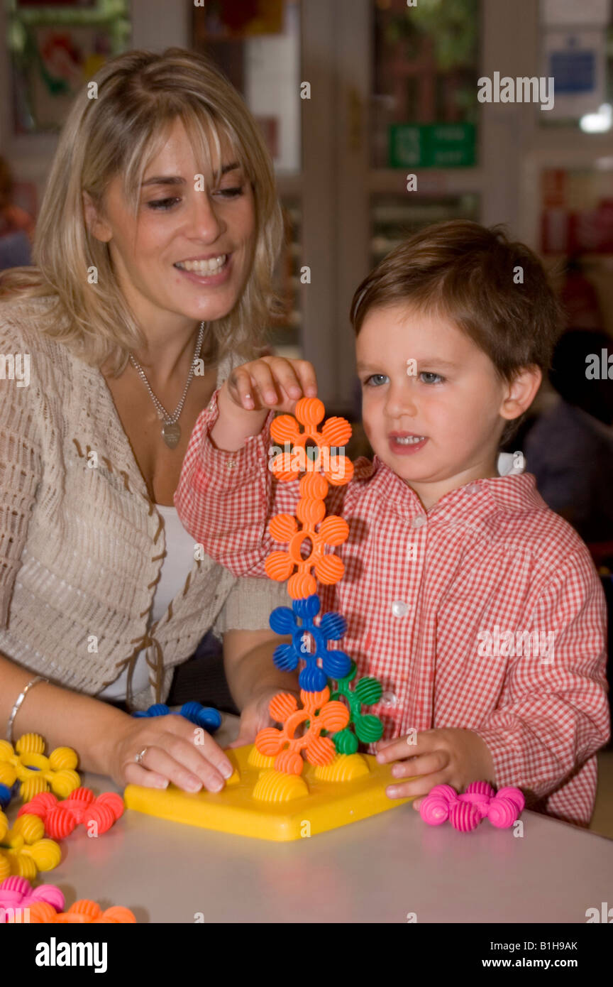 Kindergarten children assistant hi-res stock photography and images - Alamy