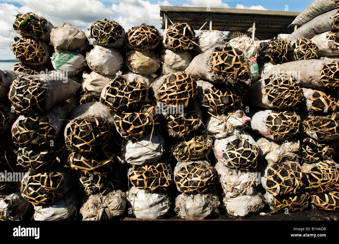 Coal in sacks waiting to be transported in Stone Town Port, Zanzibar ...