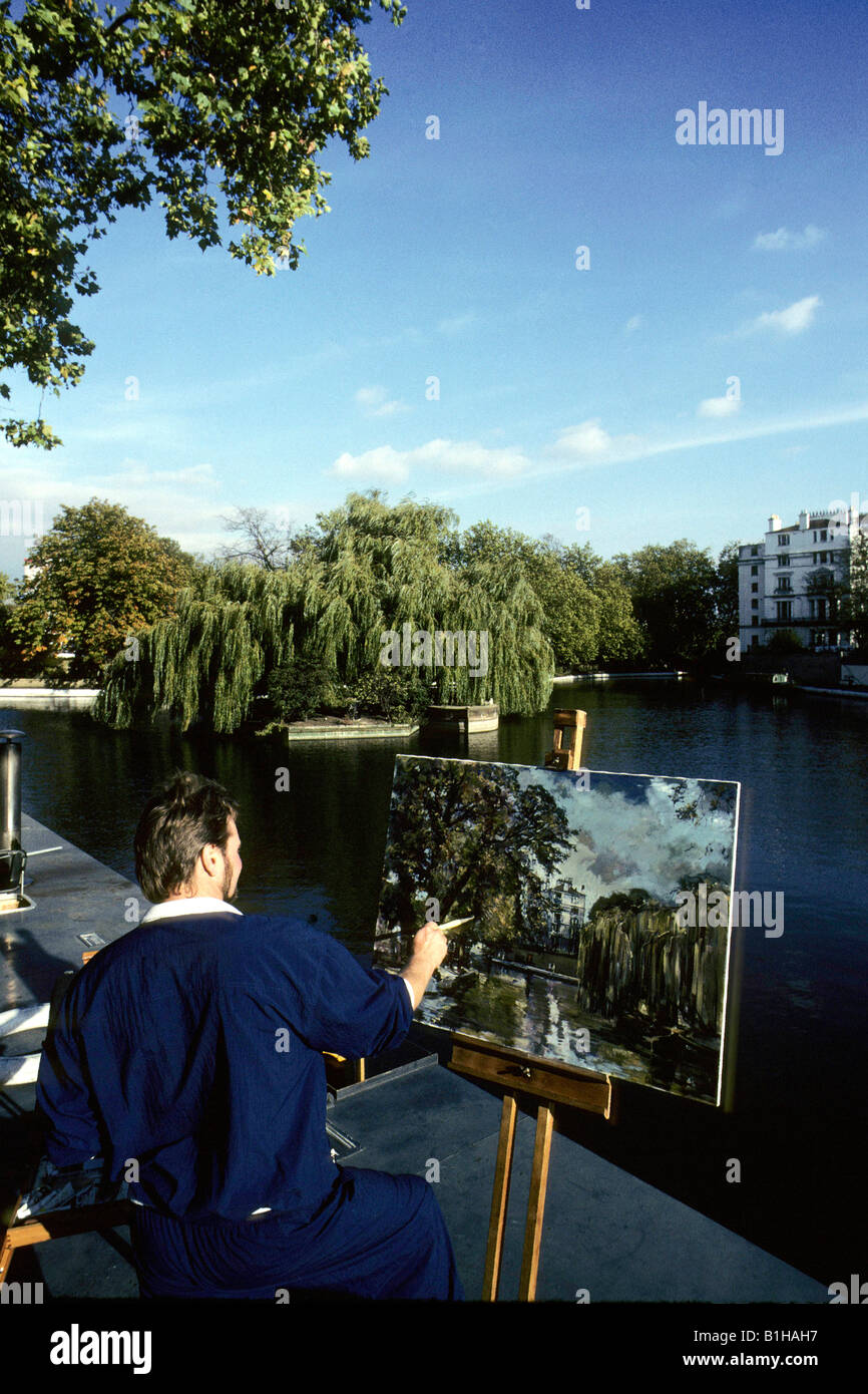 UK. London. Maida Vale. Painter Alex Prowse painting Little Venice ...