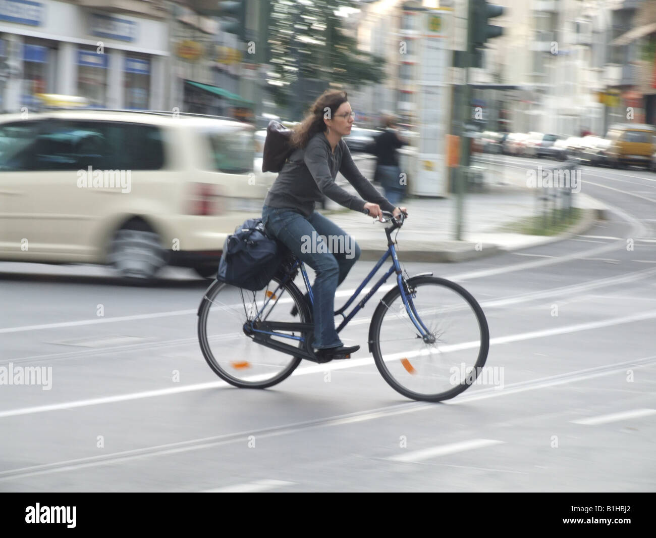 woman riding bike in berlin, germany Stock Photo - Alamy