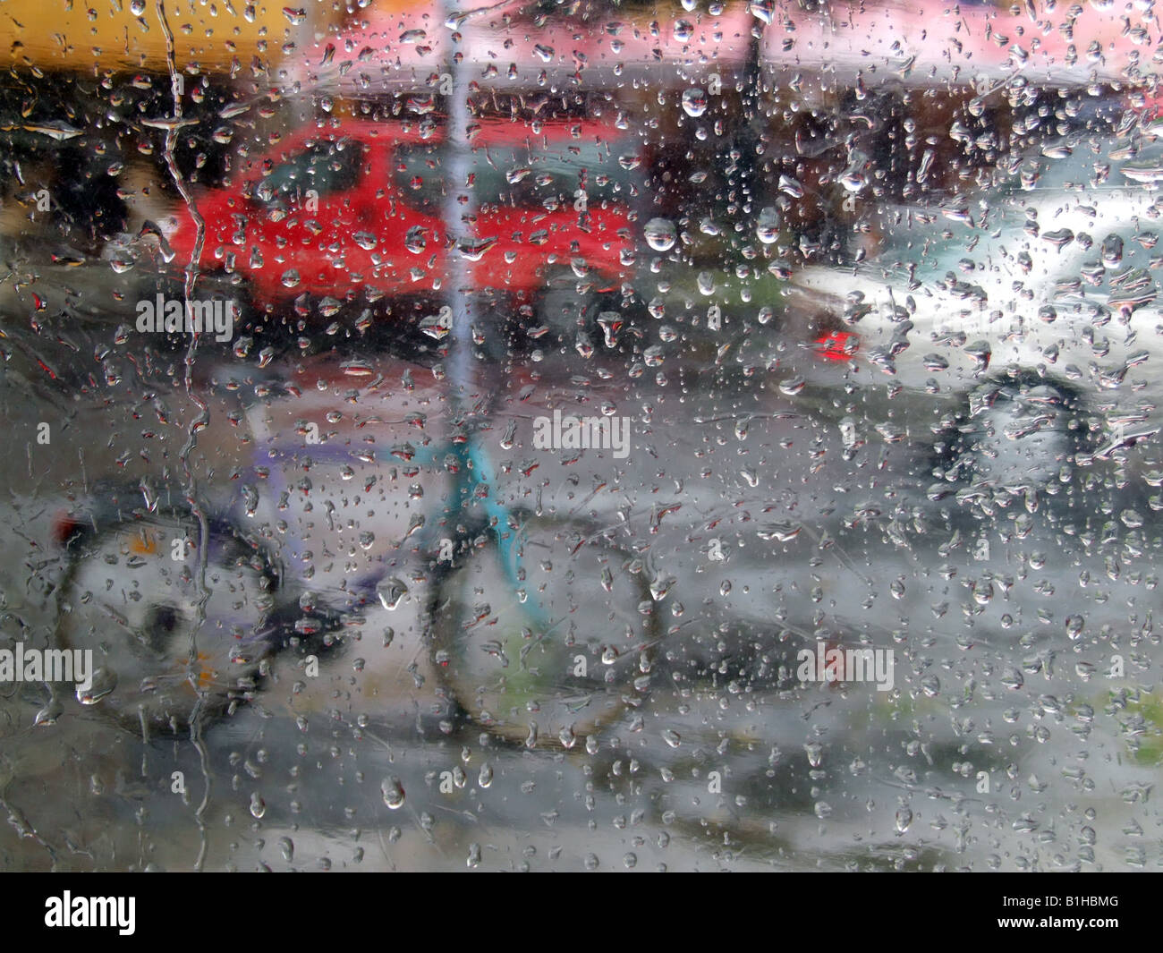 abstract street scene with rain drops on window Stock Photo - Alamy