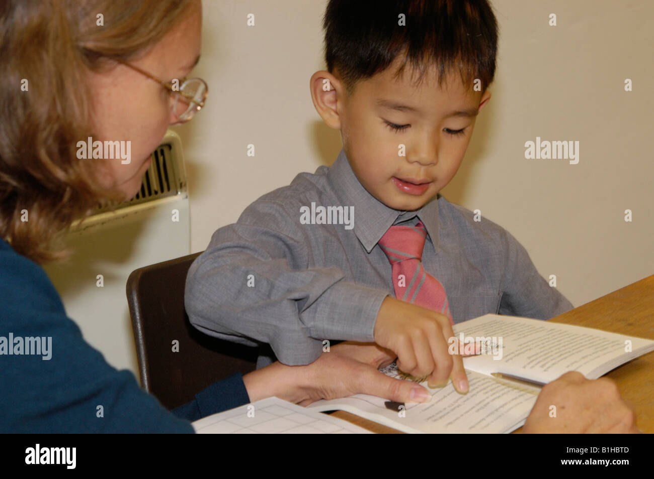 Mixed race schoolboy learning hi-res stock photography and images - Alamy