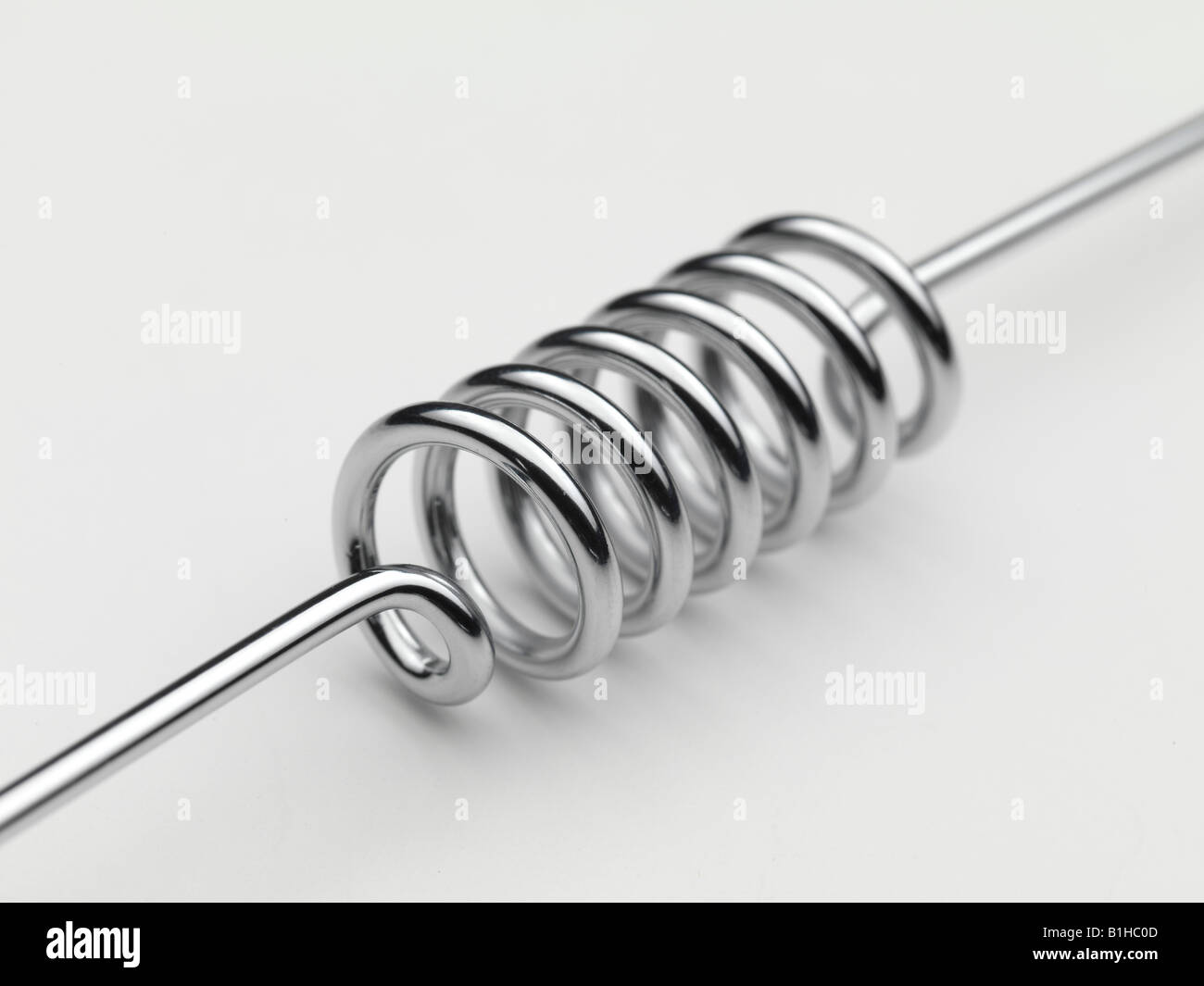 spring metal steel iron stick rendering spiral Stock Photo - Alamy