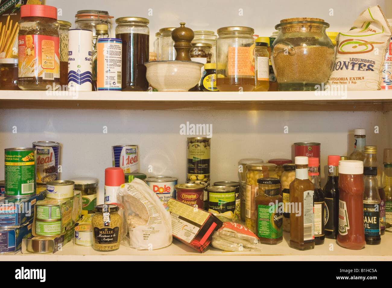 Kitchen food storage cupboard Stock Photo - Alamy