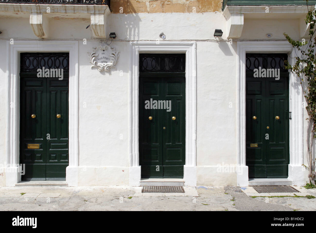 Three green doors hi-res stock photography and images - Alamy