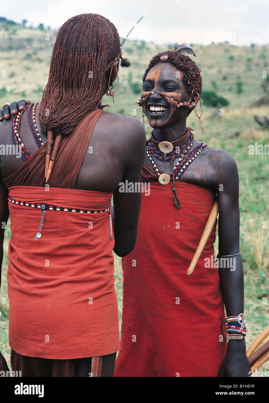 Two Maasai moran warriors greeting each other Masai Mara National ...