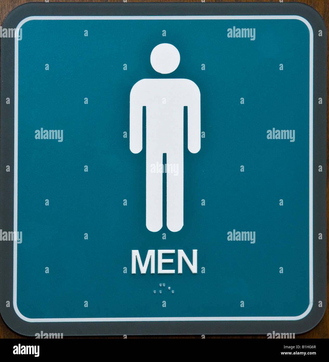 mens restroom sign on blue background Stock Photo - Alamy