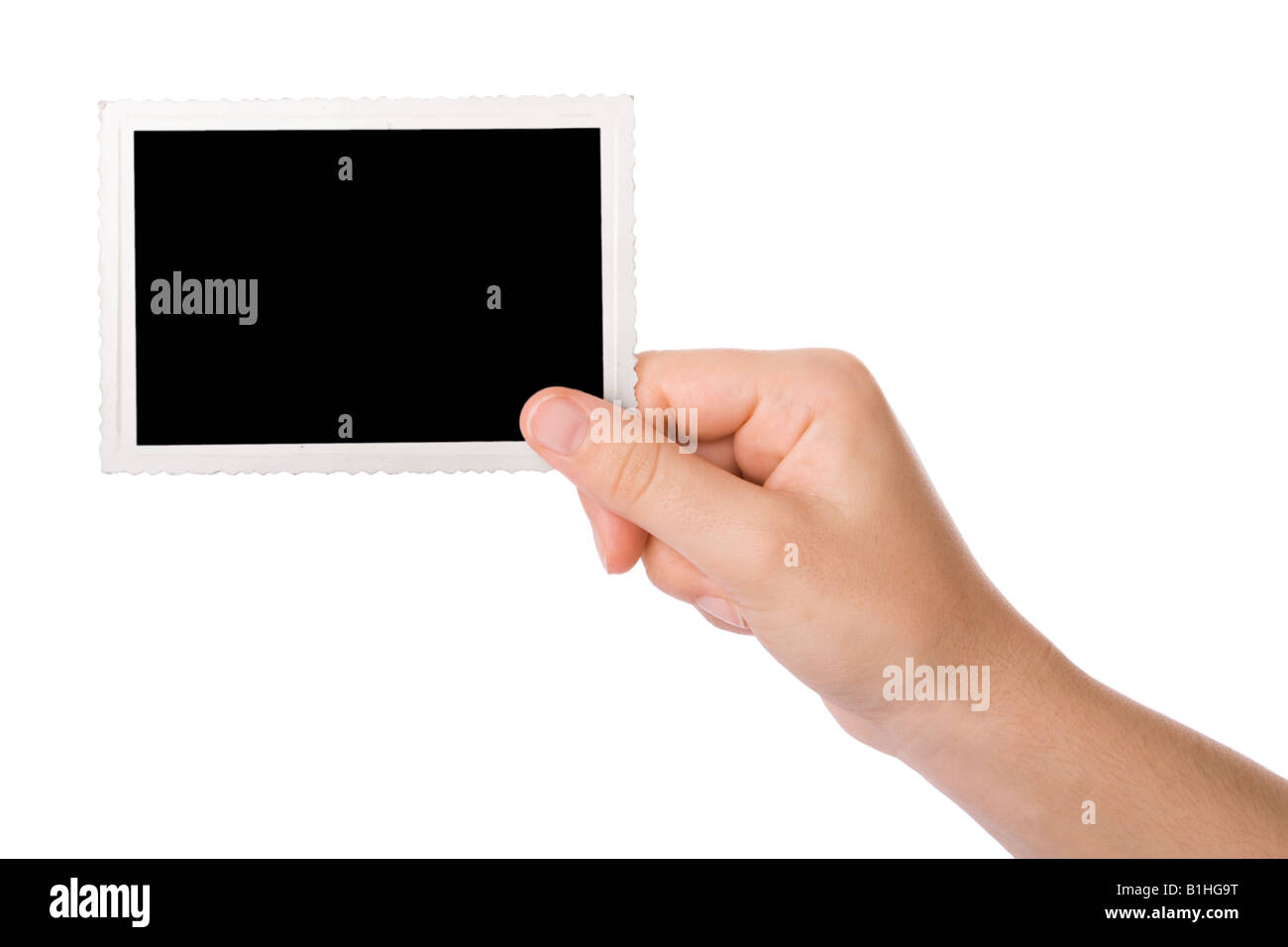 Hand holding a photograph isolated on a white background Stock Photo ...