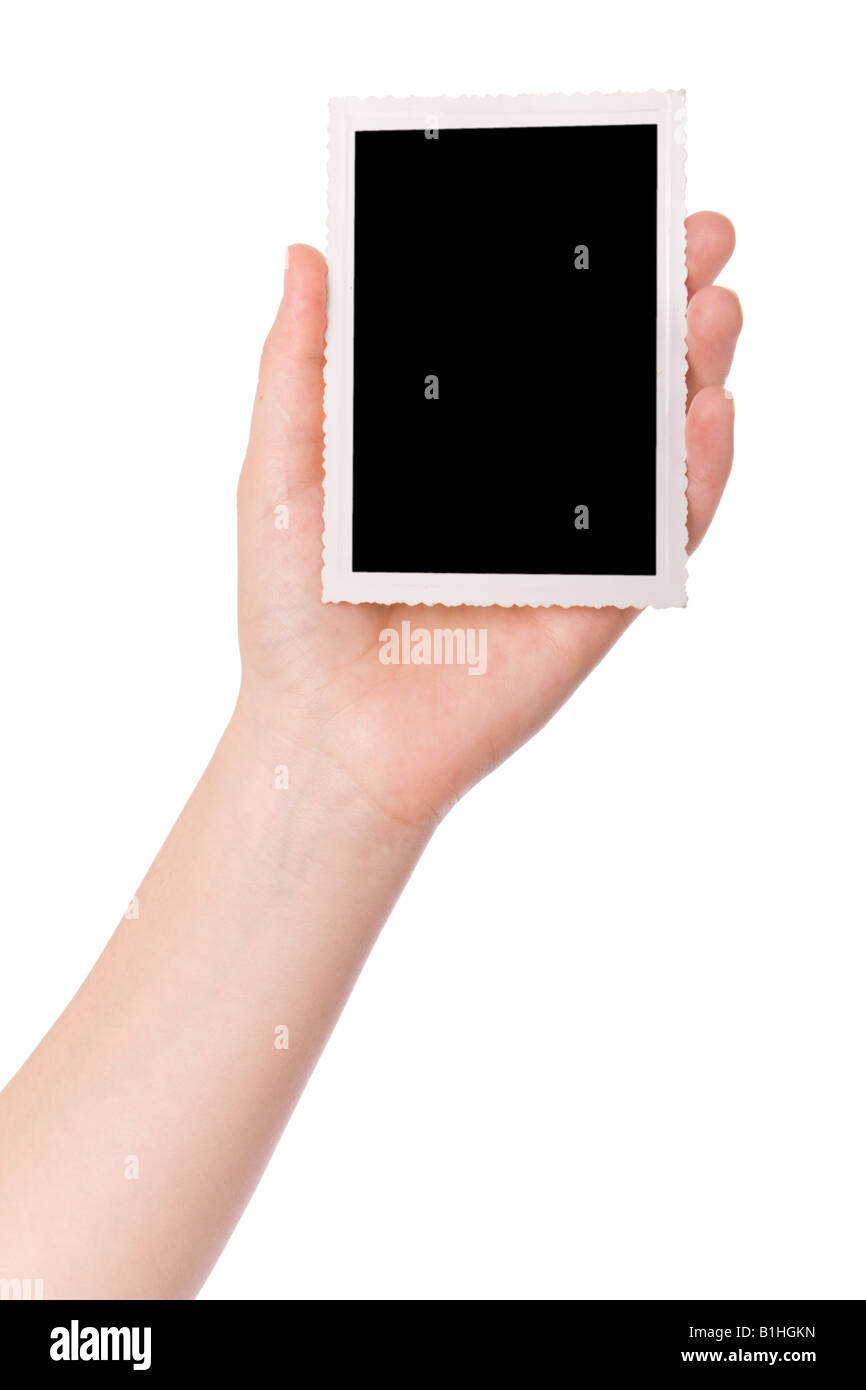 Hand holding a photograph isolated on a white background Stock Photo ...