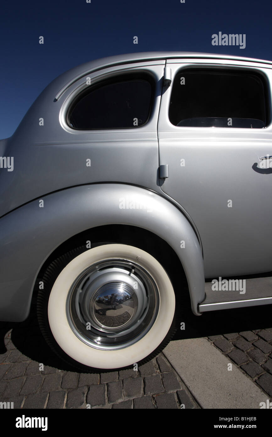 BACK HALF OF SILVER VINTAGE CAR DARK BLUE SKY VERTICAL BDB10052 Stock ...