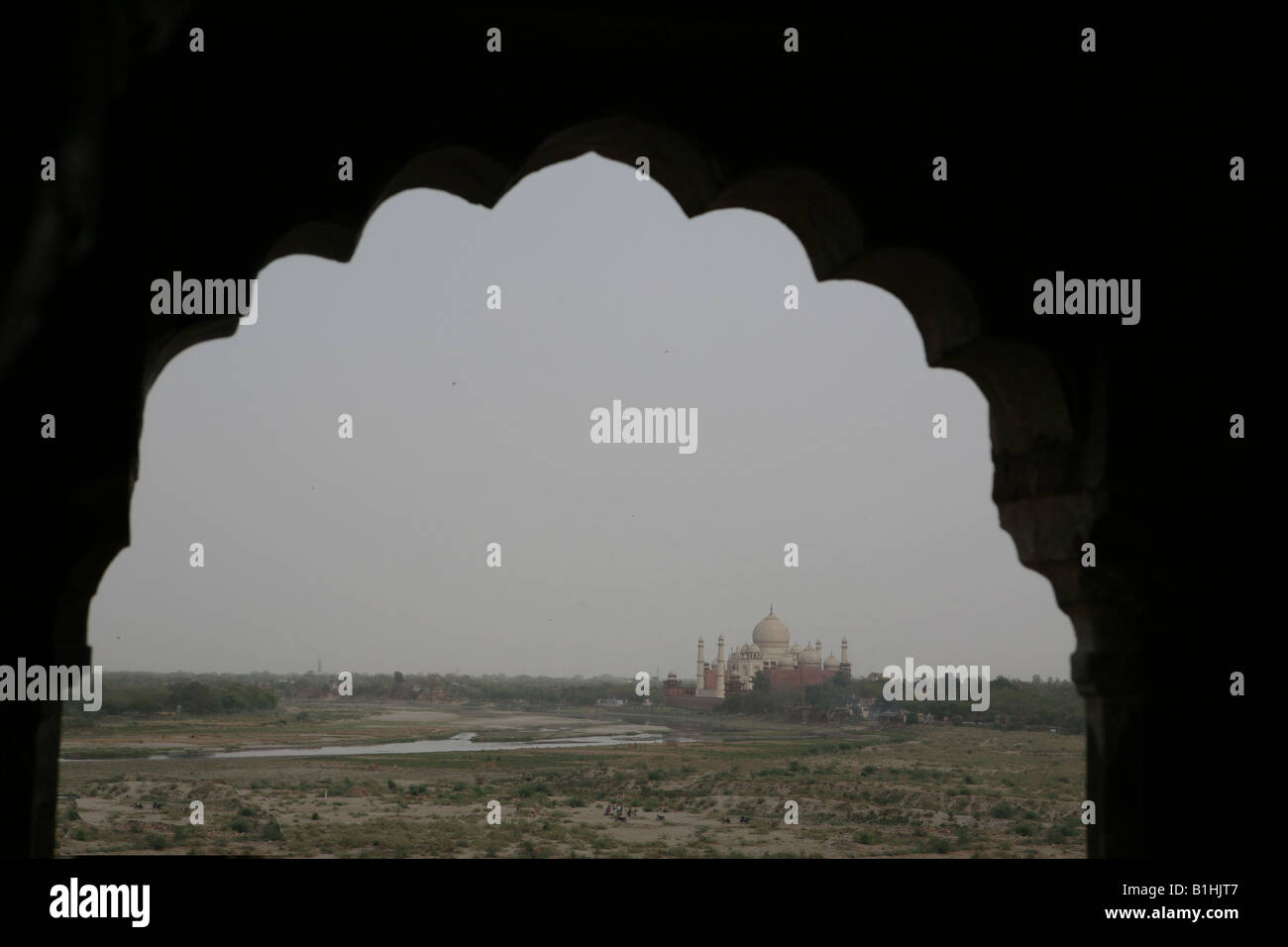 Looking at the Taj Mahal from an arch in the Red Fort Agra India AKA ...