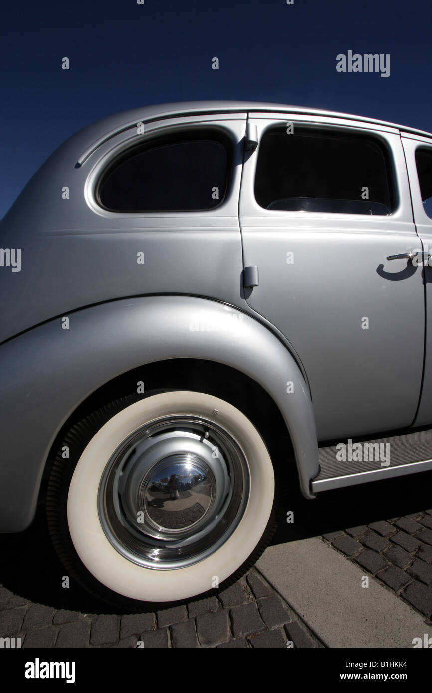 BACK HALF OF SILVER VINTAGE CAR DARK BLUE SKY VERTICAL BDB10051 Stock ...