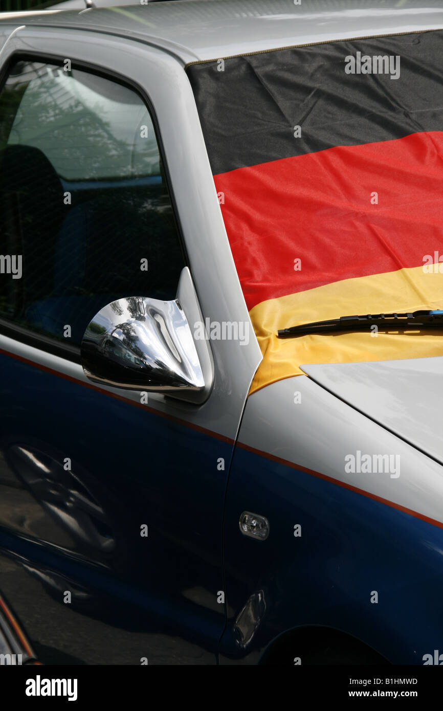 one german flag covering car windscreen Stock Photo - Alamy