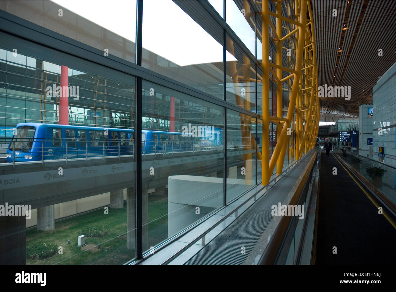 Automated train carrying passengers between terminals of the new ...