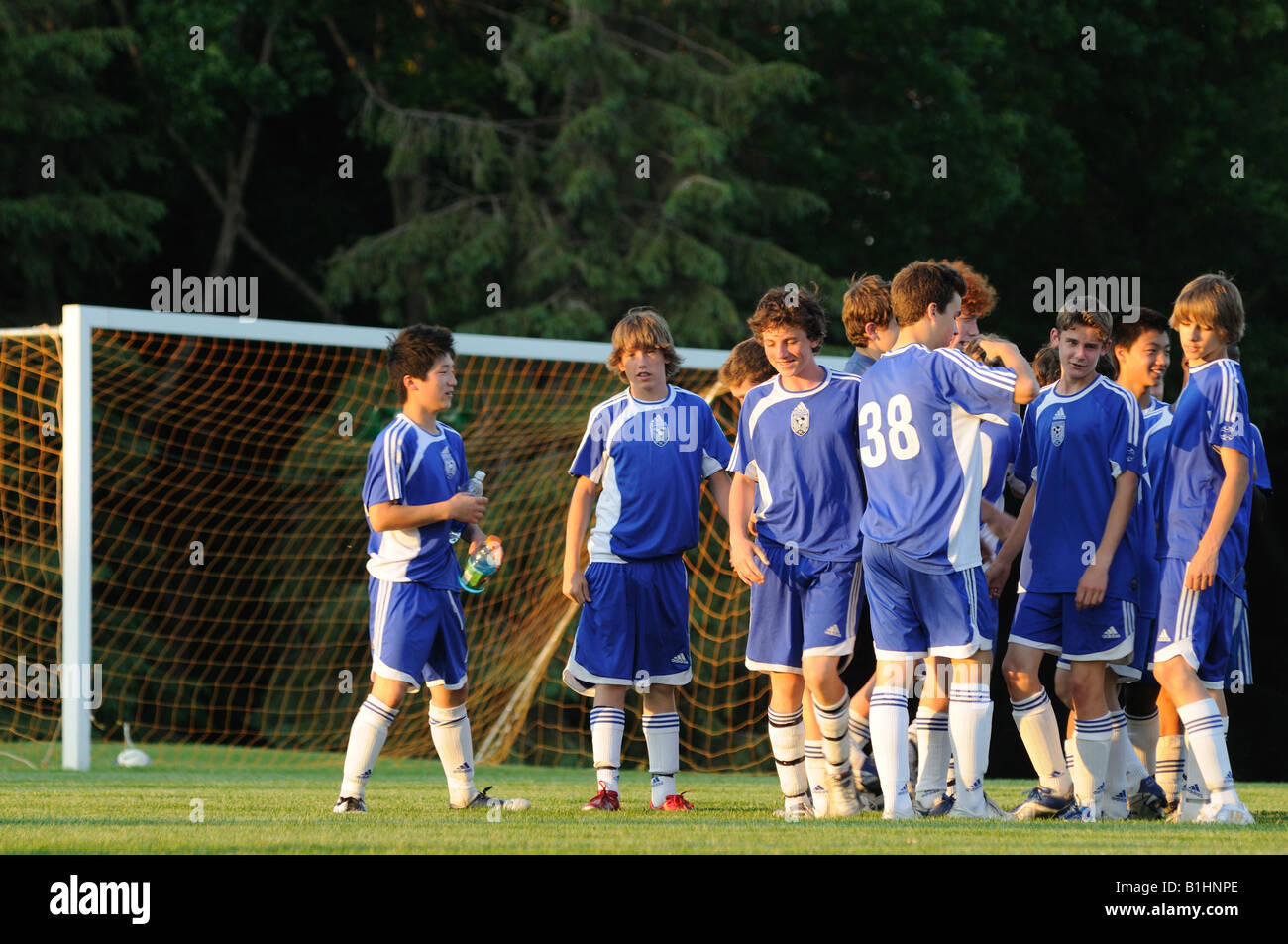 Pep talk before the game Stock Photo - Alamy