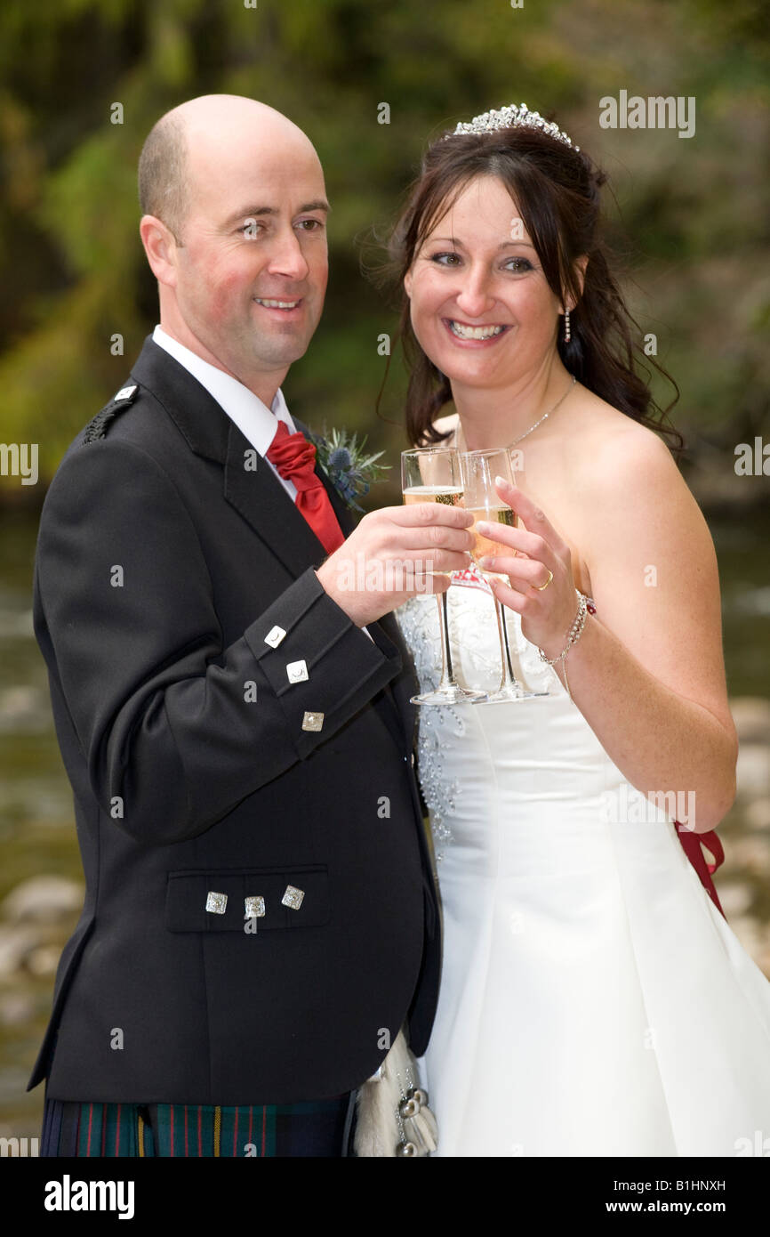 Scottish Wedding married couple celebrating with champagne, Scotland ...