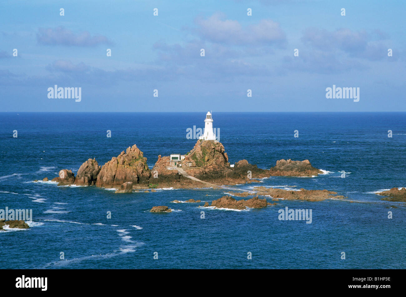 Lighthouse in the sea, La Corbiere Lighthouse, Jersey, Channel Islands ...