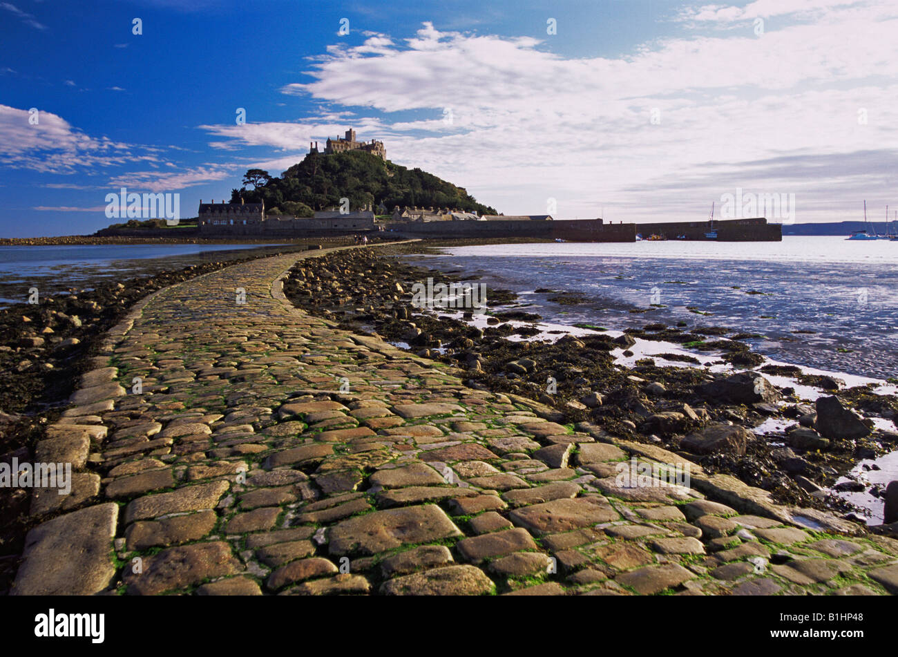 Cobblestone walkway leading towards an island, St. Michael's Mount ...