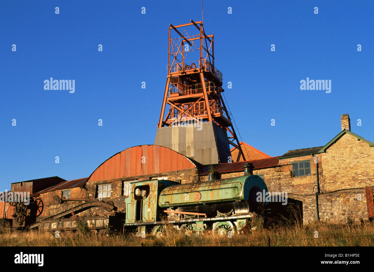 Low angle view of an old pit mining structure, Big Pit National Coal ...