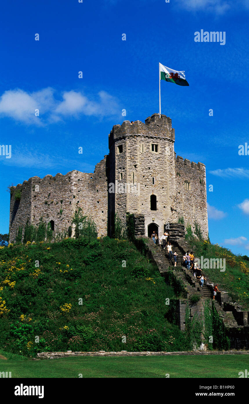 Low angle view of tourists entering into a castle, Cardiff Castle ...