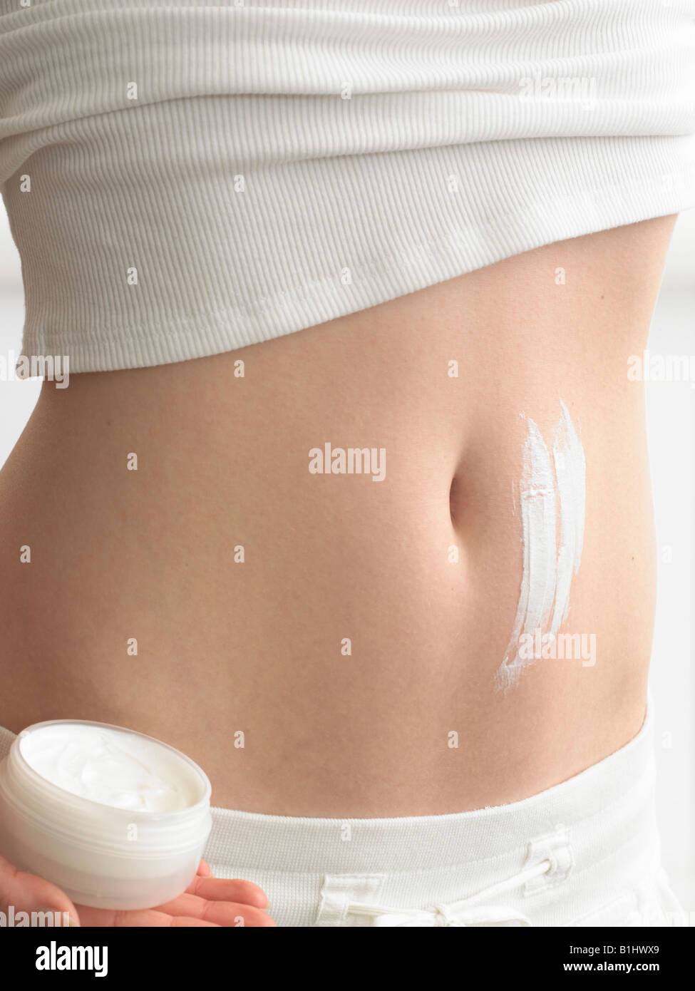 Cream streaks on a belly Stock Photo - Alamy