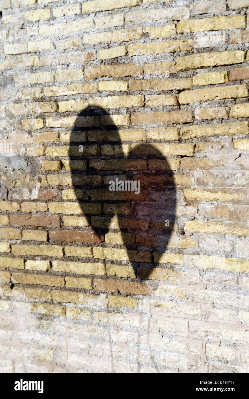 two balloons shadow against wall Stock Photo - Alamy