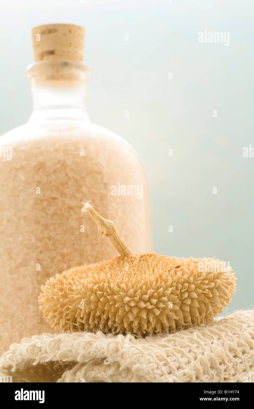 A bottle of bath salts and other bathing utensils Stock Photo - Alamy