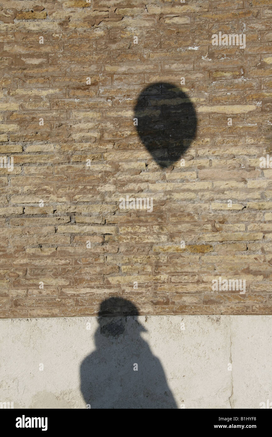 one person and balloon shadow against wall Stock Photo - Alamy