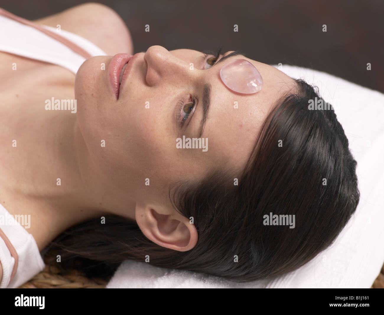 Woman with gemstone on her forehead Stock Photo - Alamy
