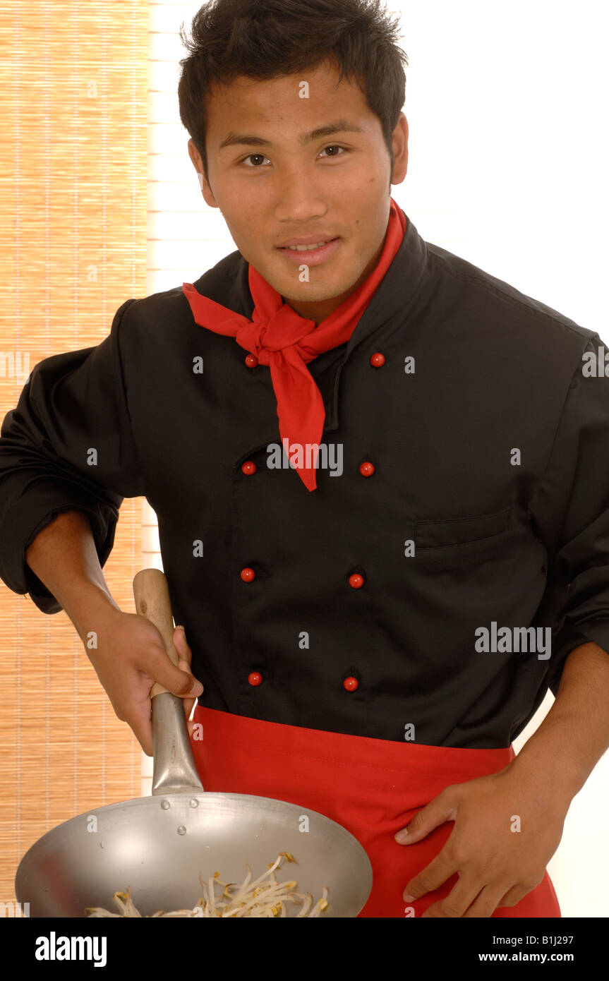 Asian chef with Wok Stock Photo - Alamy