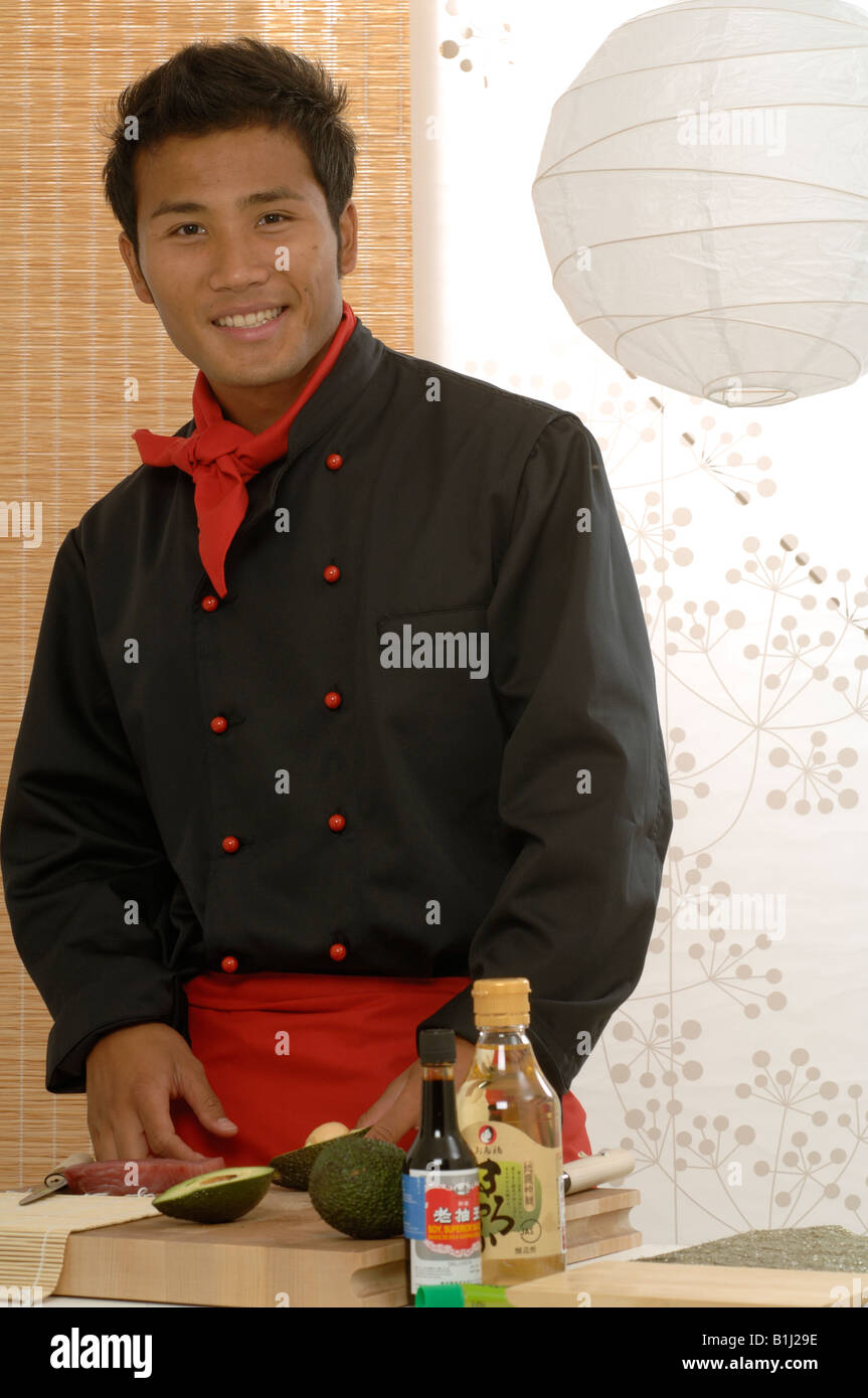Asian chef preparing food Stock Photo - Alamy