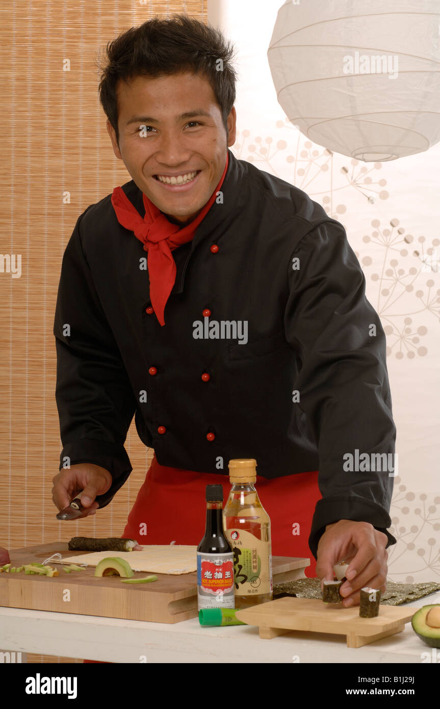 Asian chef preparing food Stock Photo - Alamy