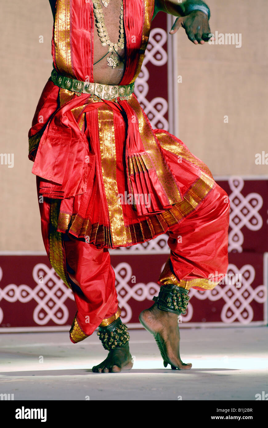 Low section view of a man performing Bharatnatyam, a classical dance of ...