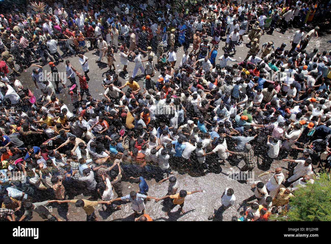 High angle view of devotees pulling a chariot in a religious chariot ...
