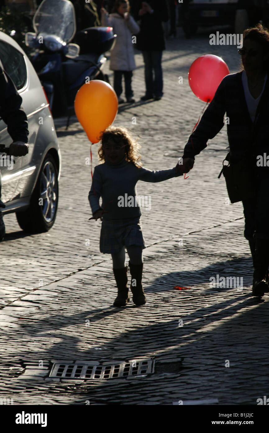 Girl holding balloon shadow in rome hi-res stock photography and images ...