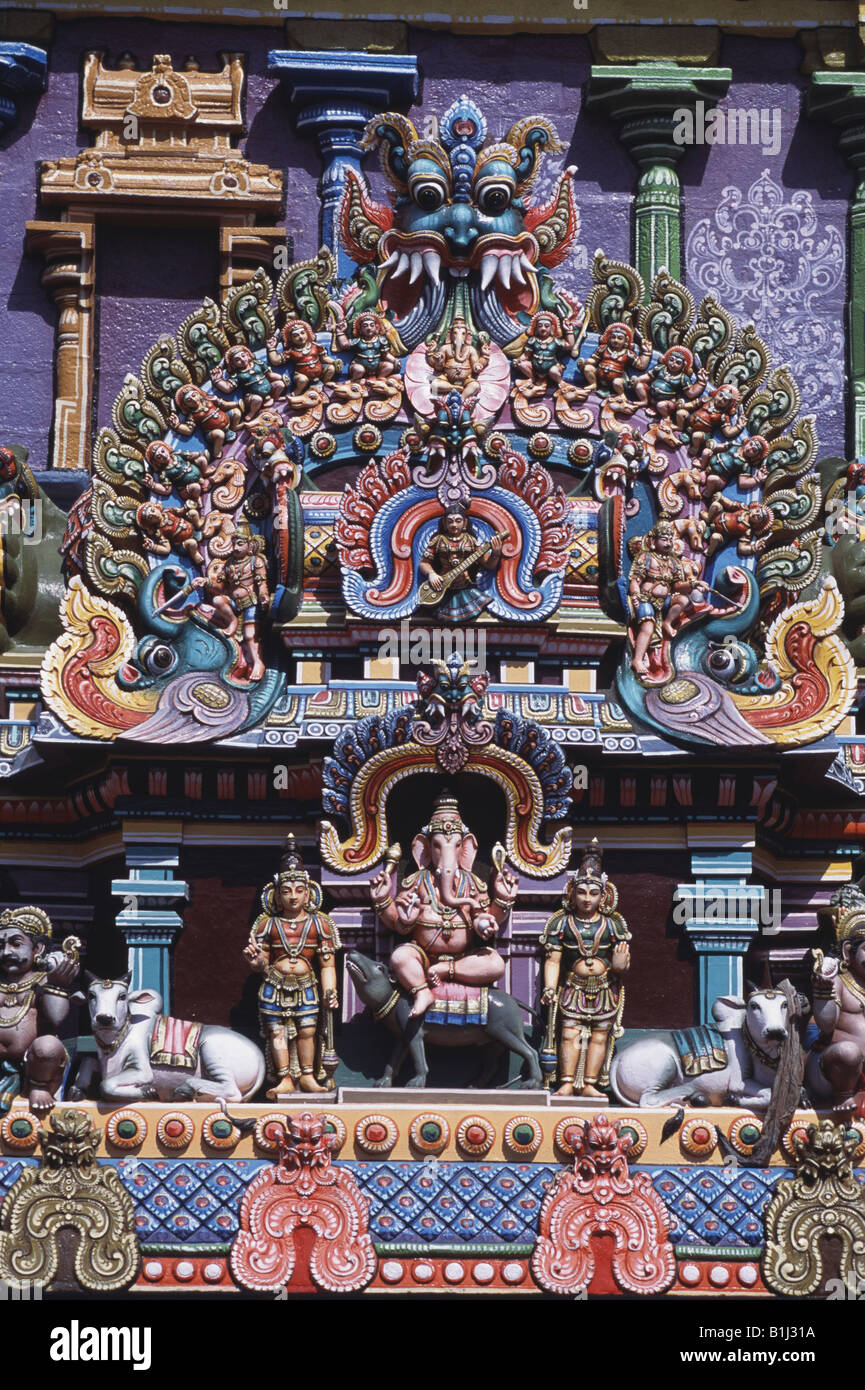 Stucco figures on a tower of a temple, Jambukeswarar Temple ...
