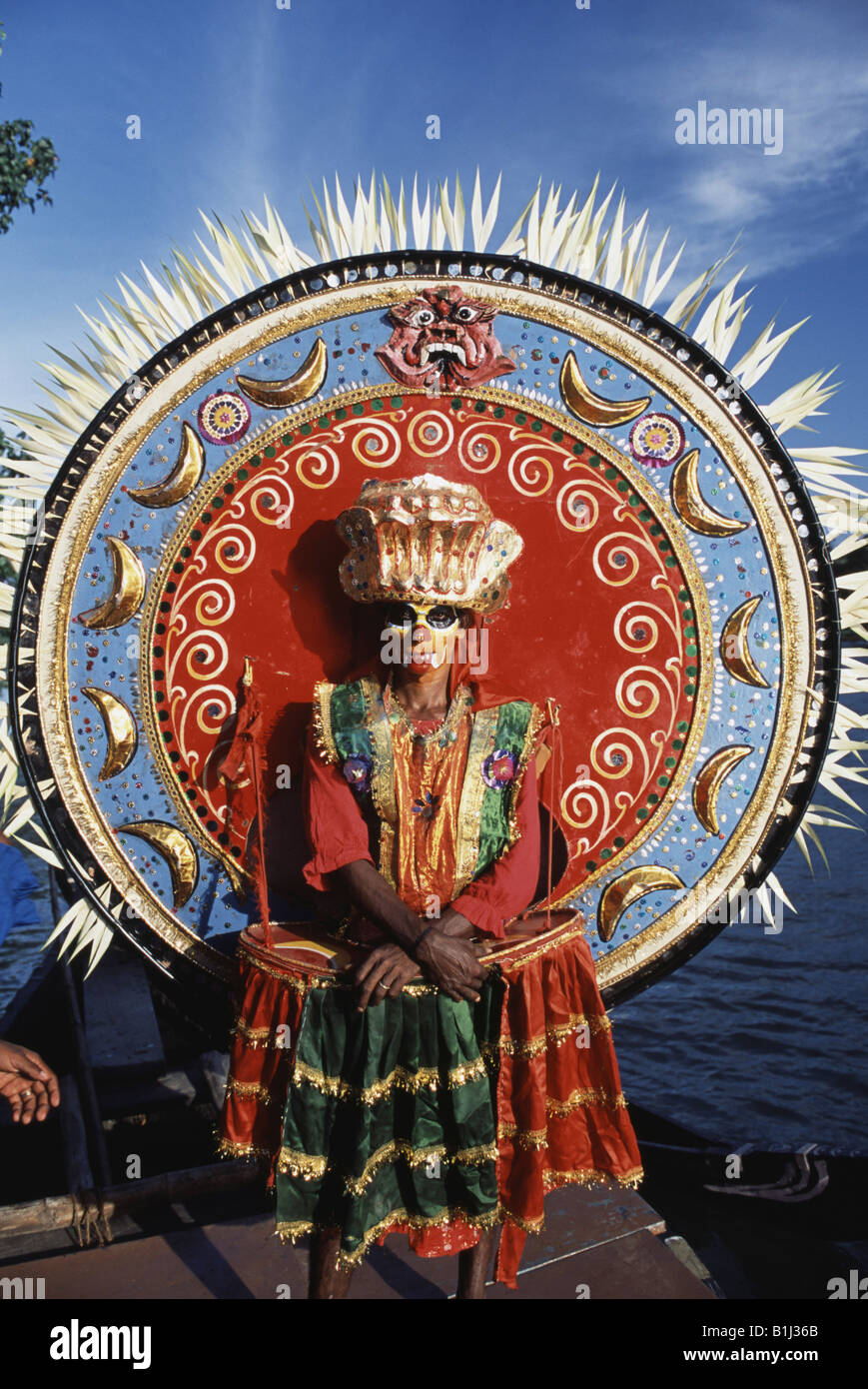 Person in a Theyyam dance costume, Kerala, India Stock Photo - Alamy