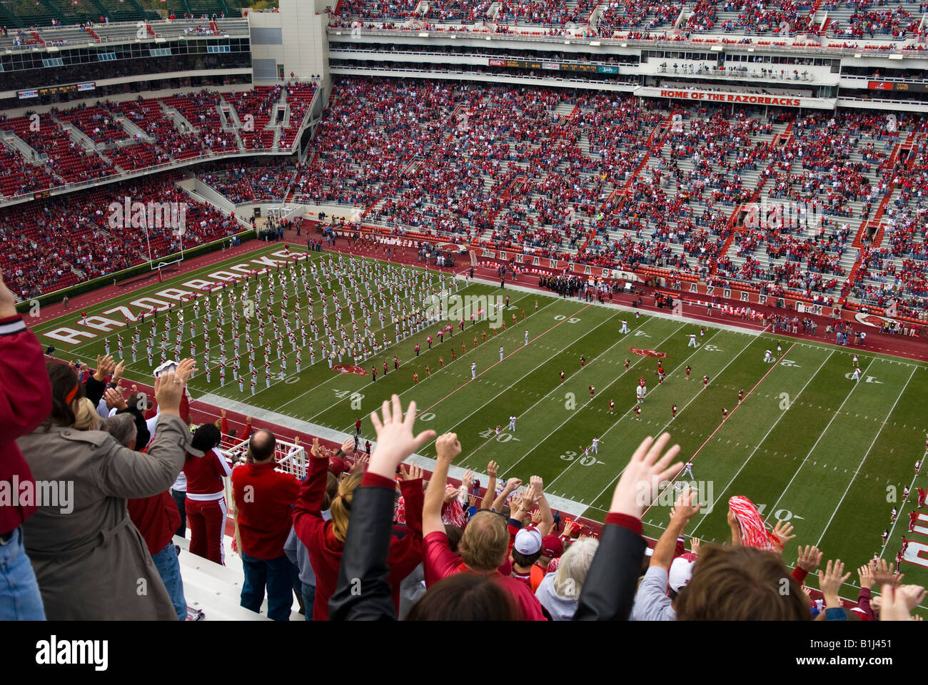 High angle view of spectators cheering at a football stadium Stock ...