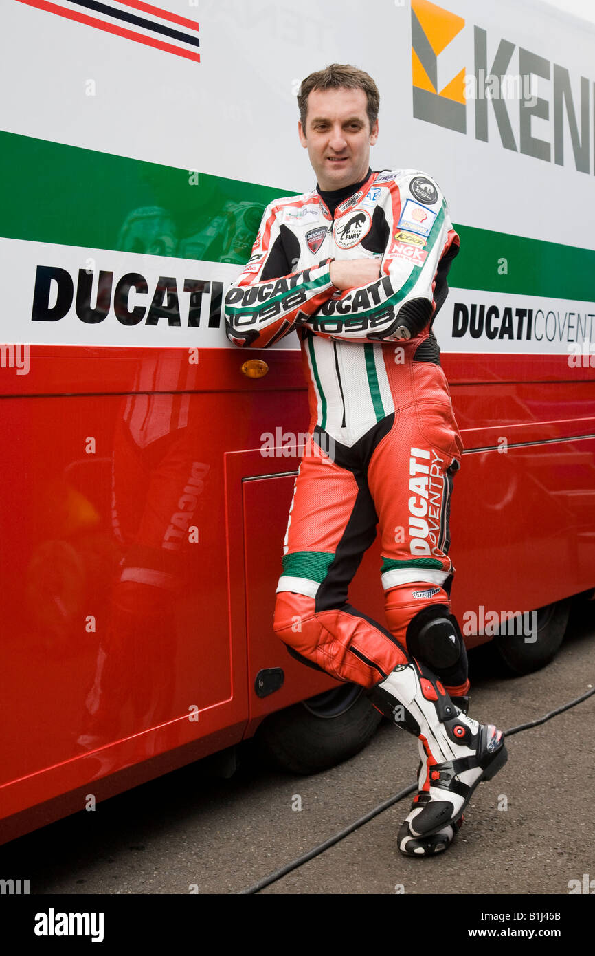 Michael Rutter rests against his Ducati team transporter in the Paddock ...