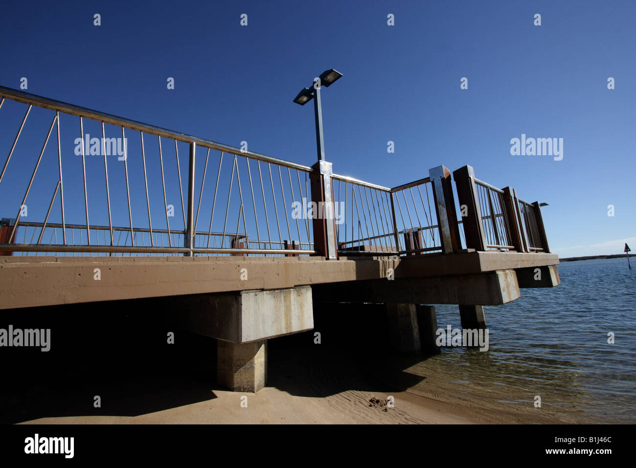 TIMBER JETTY LOOKING TOWARDS WATER HORIZONTAL BDB10093 Stock Photo - Alamy