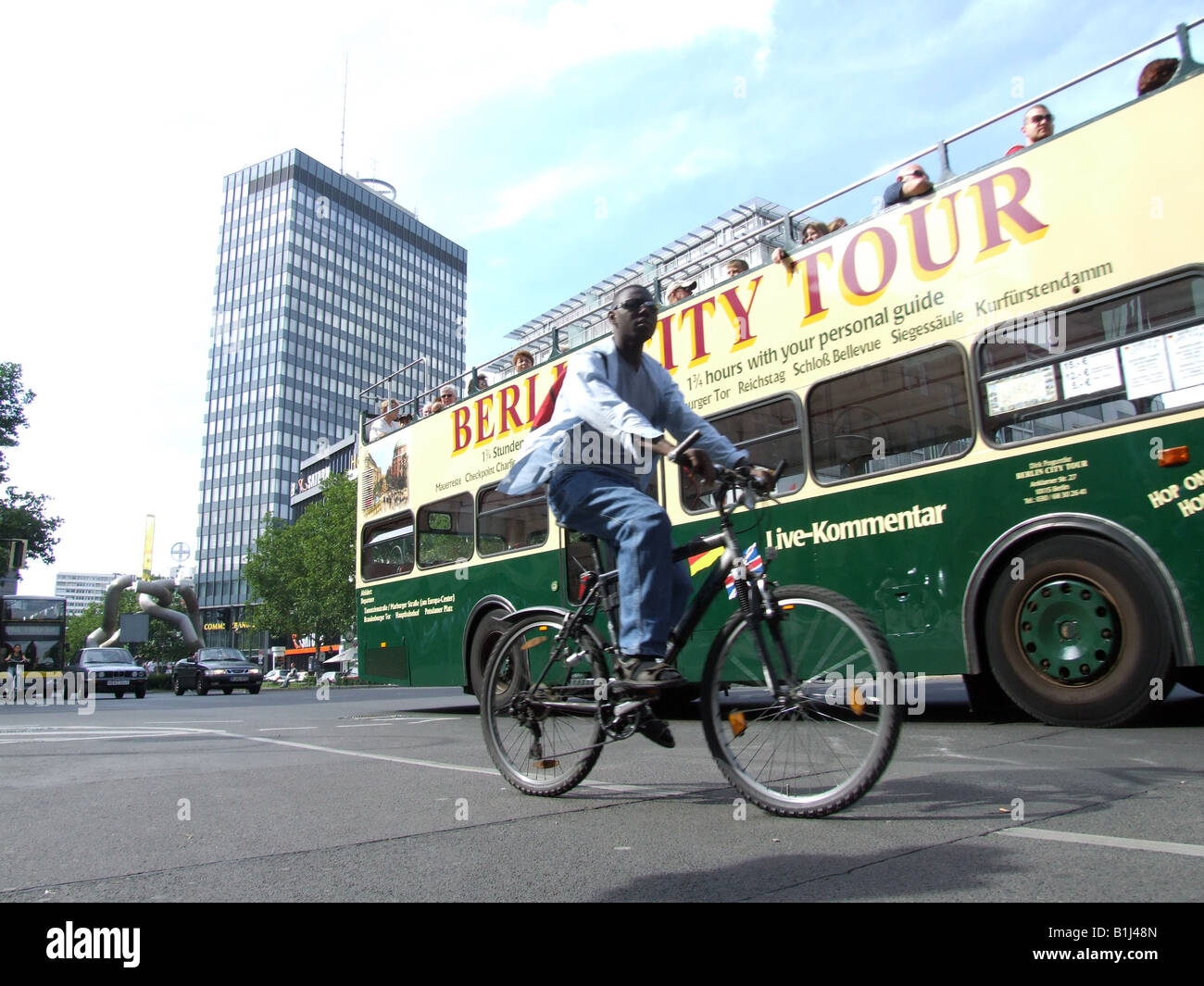 person riding bike in berlin germany Stock Photo - Alamy