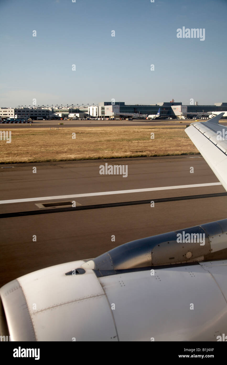 Aerial view north with commercial aircraft of Heathrow Airport ...