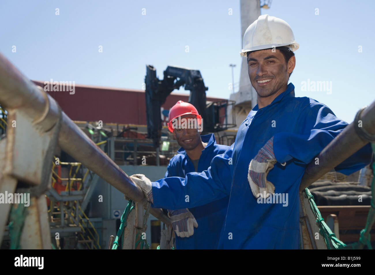 Portrait of two harbour workers Stock Photo - Alamy