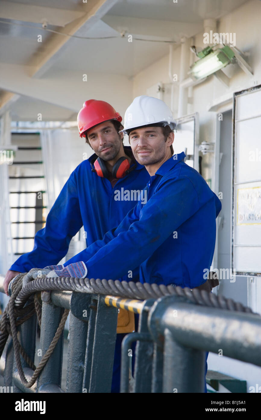 Portrait of two harbour workers Stock Photo - Alamy
