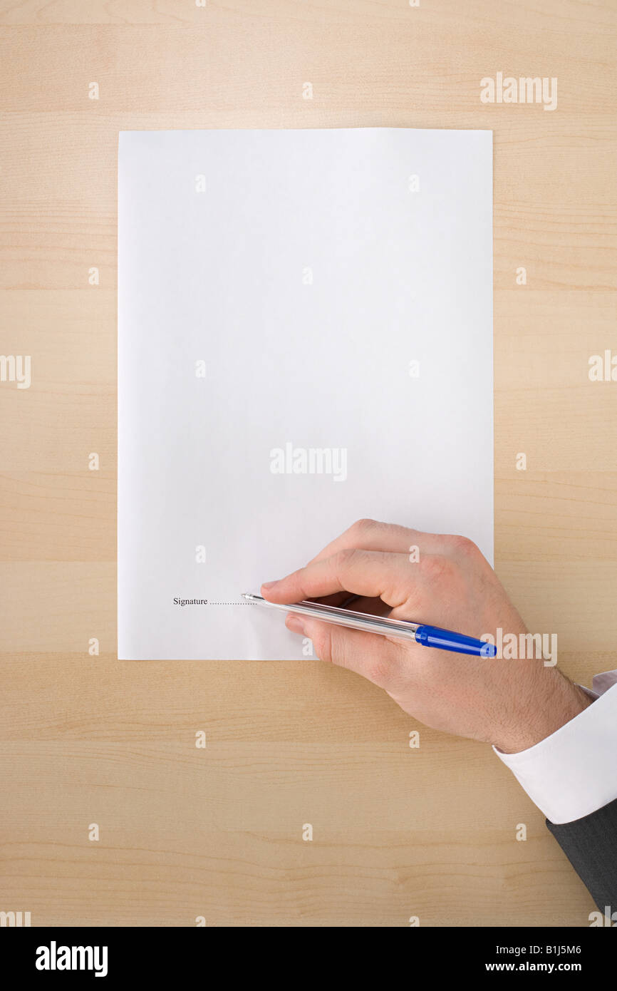 Signing His High Resolution Stock Photography and Images - Alamy