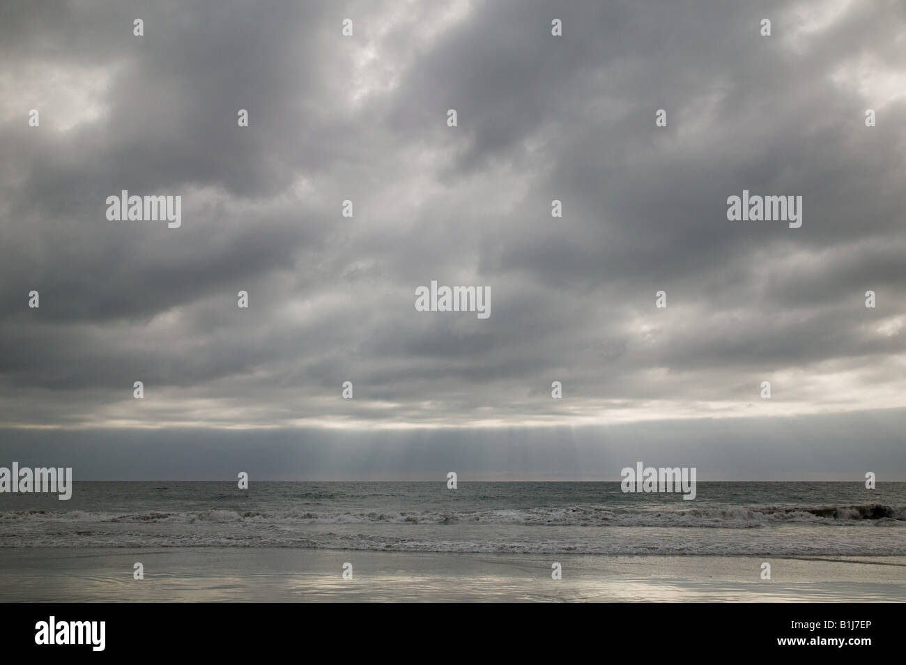 Ocean and cloudy sky Stock Photo - Alamy