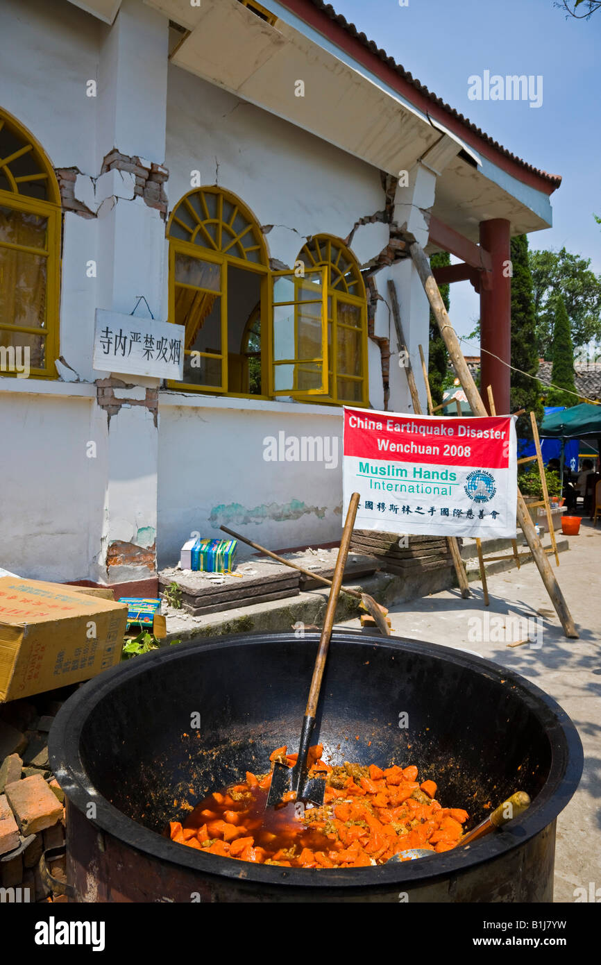 Food cooking outside earthquake severely damaged mosque in Luoshui ...